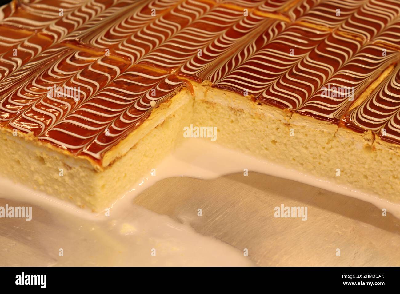 Balkan dessert Trilece in a tray Stock Photo - Alamy