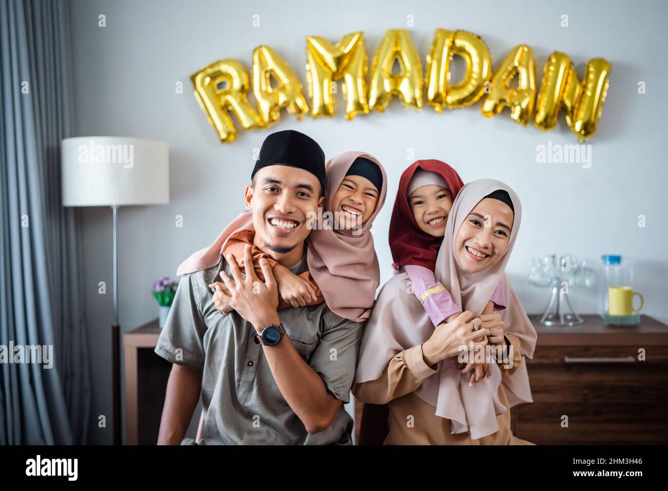 beautiful muslim family portrait together smiling to camera Stock Photo ...