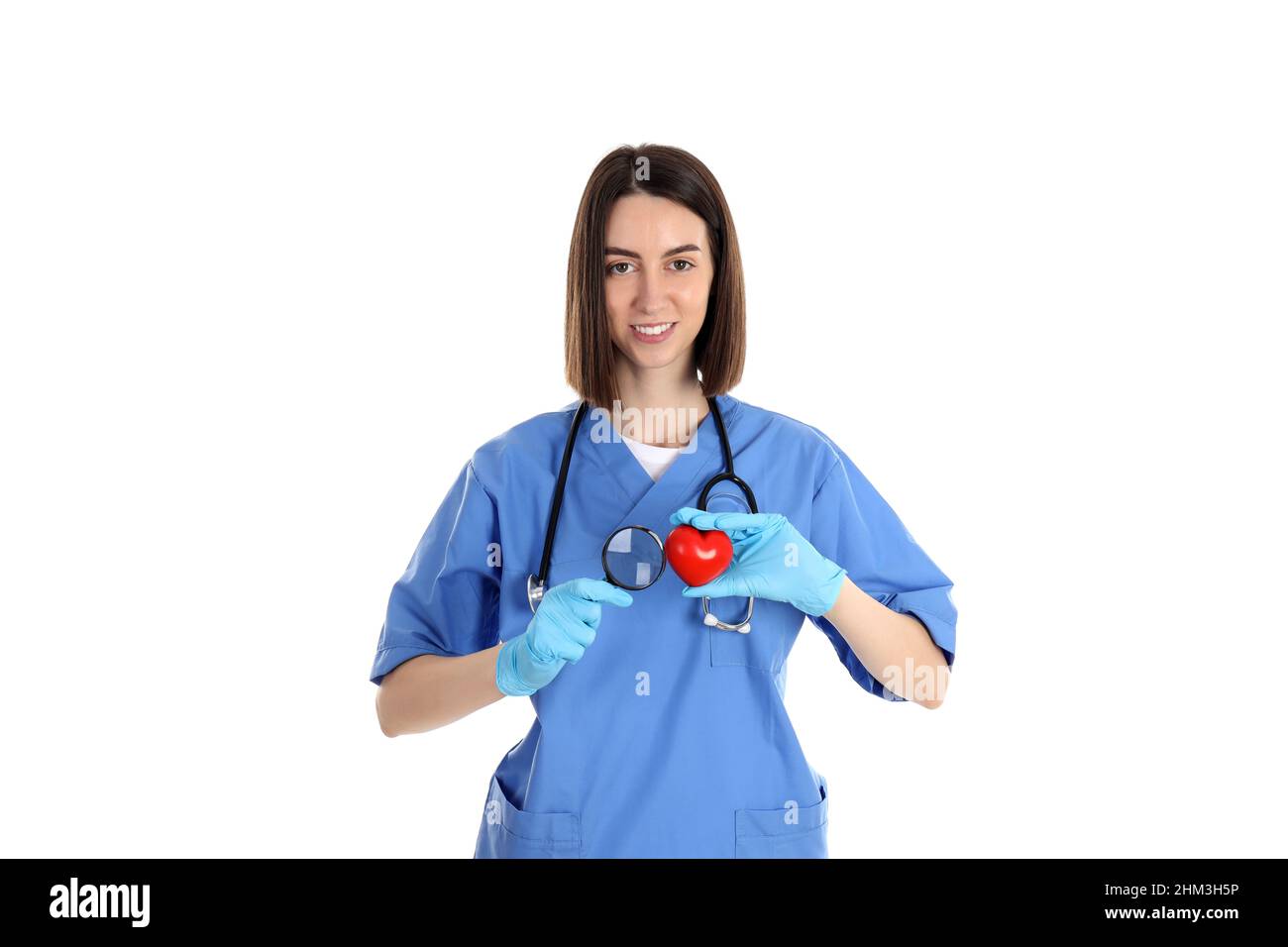 Female trainee nurse isolated on white background Stock Photo - Alamy