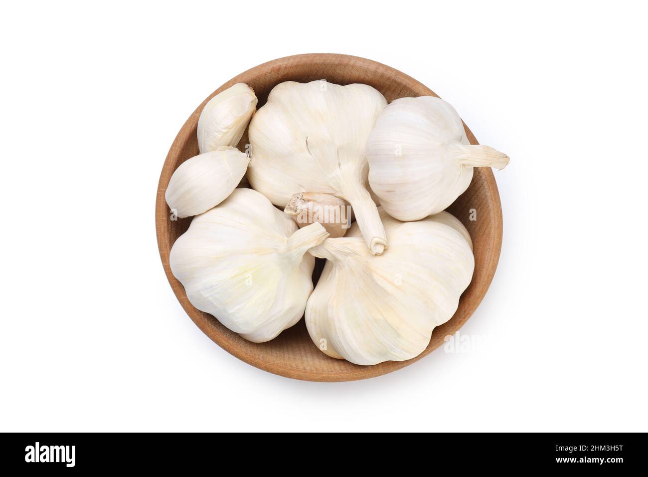 Wooden bowl with garlic isolated on white background Stock Photo - Alamy