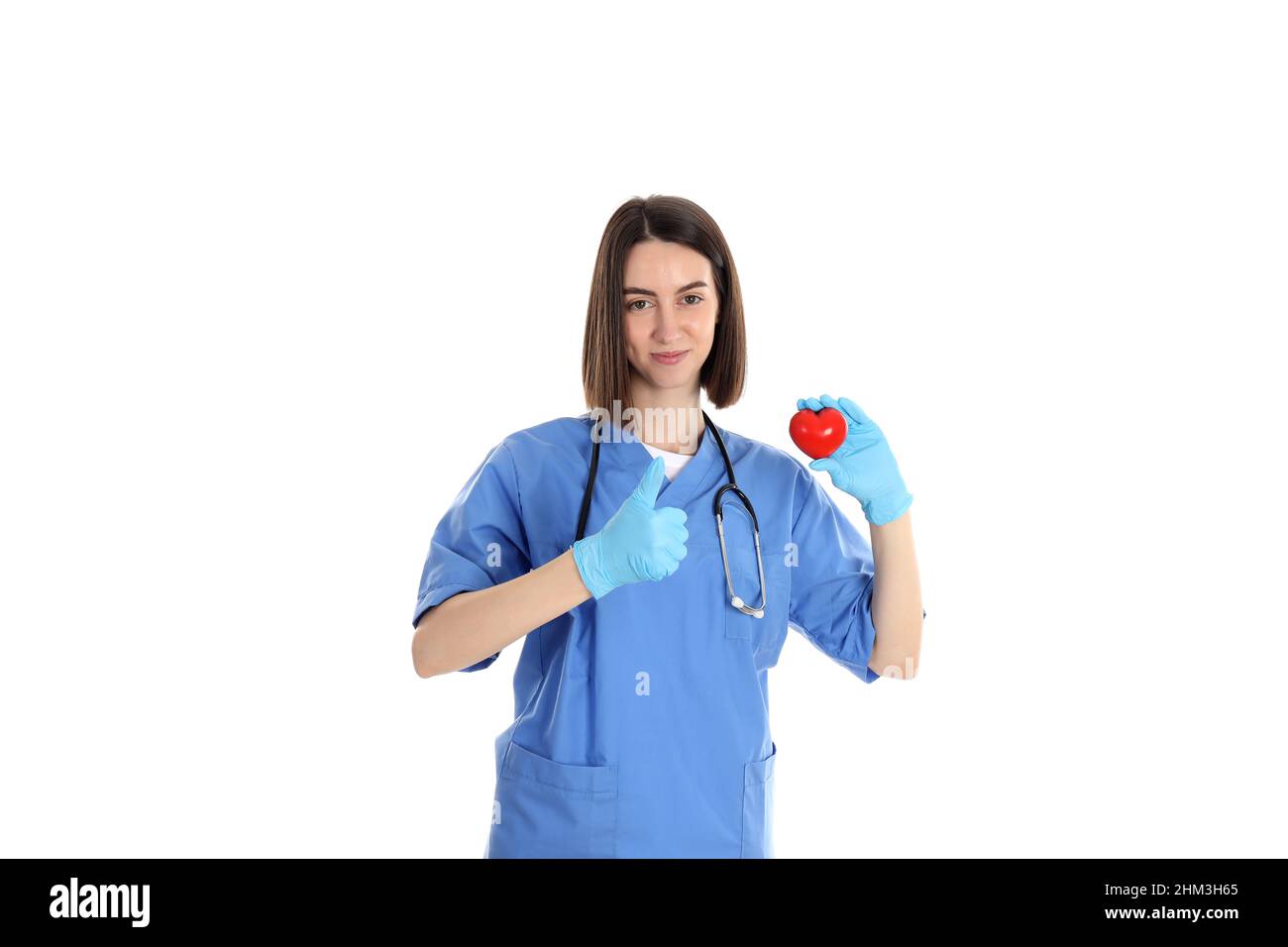 Female trainee nurse isolated on white background Stock Photo - Alamy