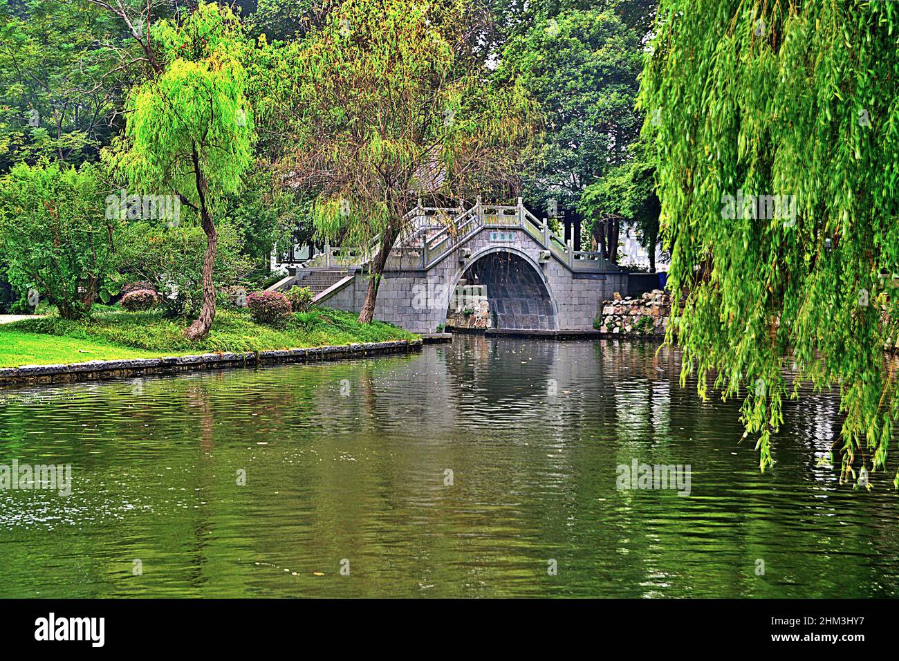 Landscape view of an Asian style bridge Stock Photo - Alamy