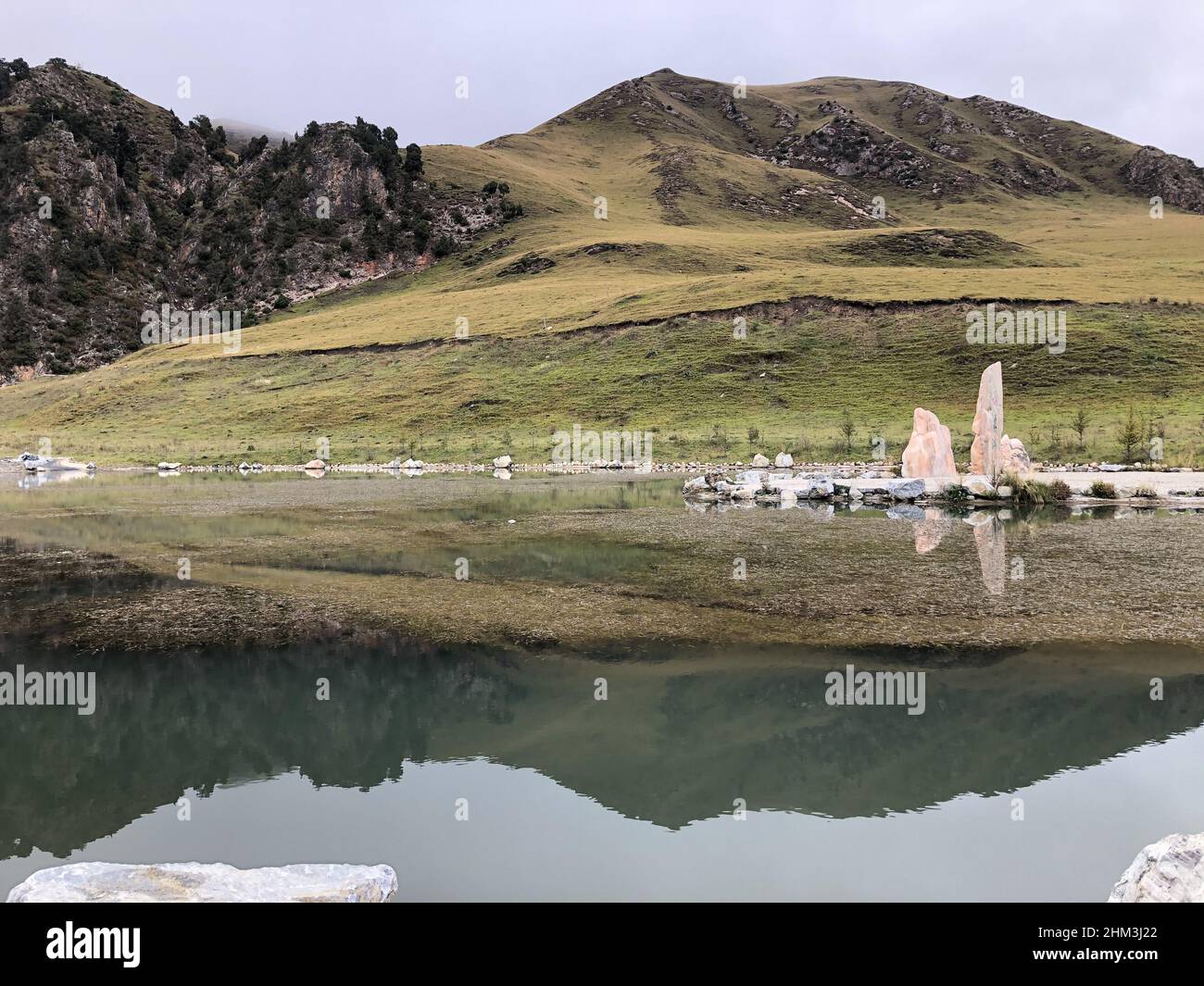 Natural landscape of a mountain and a lake with its reflection Stock ...