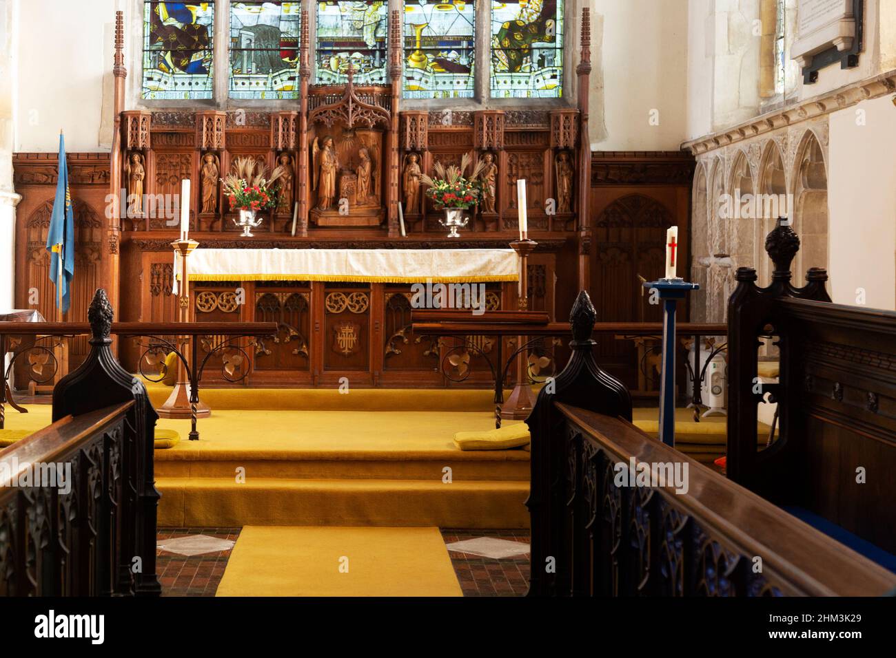Altar and carved wooden reredos, Thurston church, Suffolk, England, UK ...