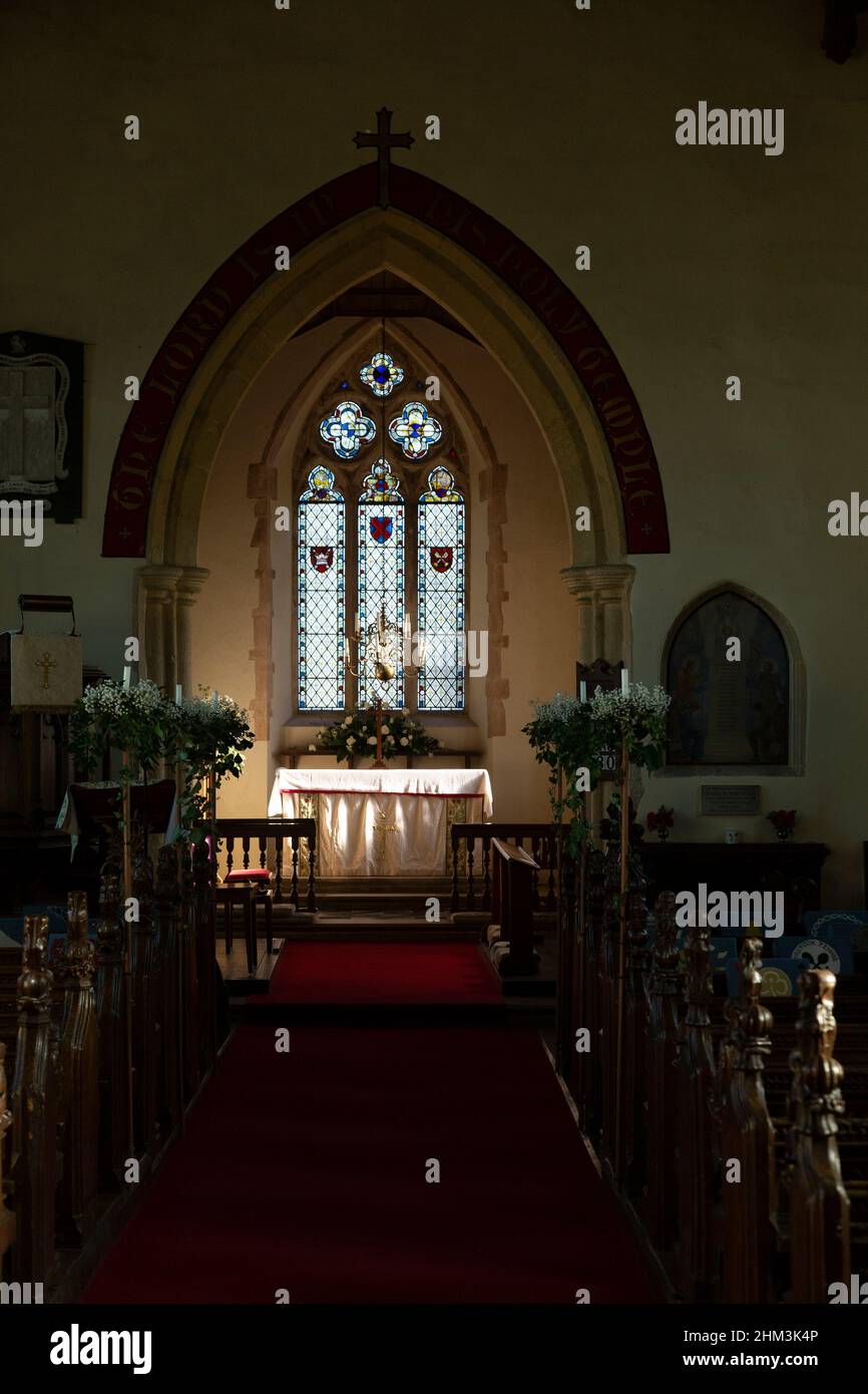 Chancel arch, altar and east window inside Tostock church, Suffolk ...