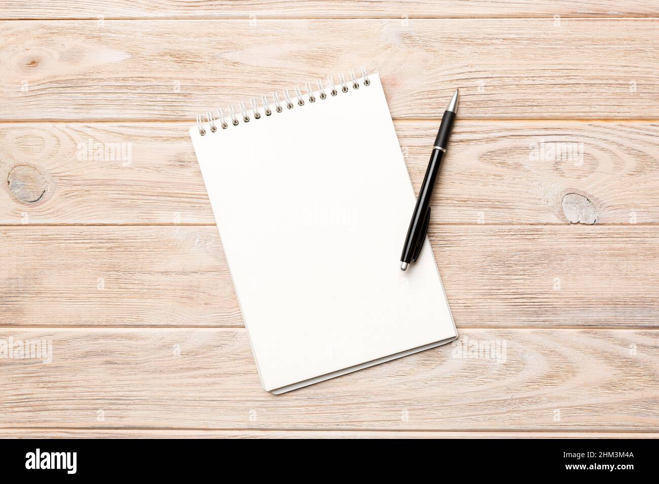 Blank notebook with pen on white background. Back to school and ...