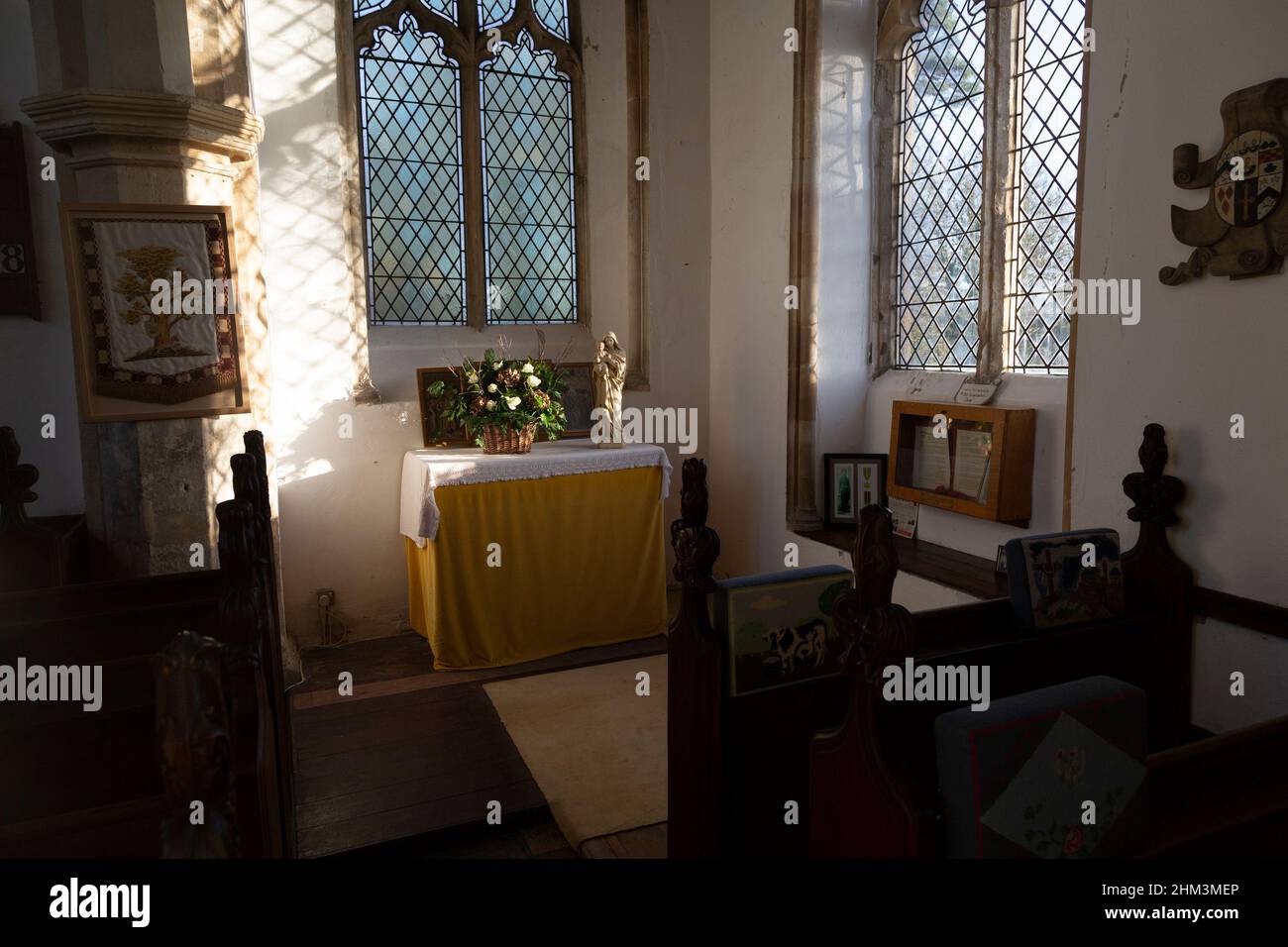 Side altar with statue of Saint Mary, Yaxley church, Suffolk, England ...