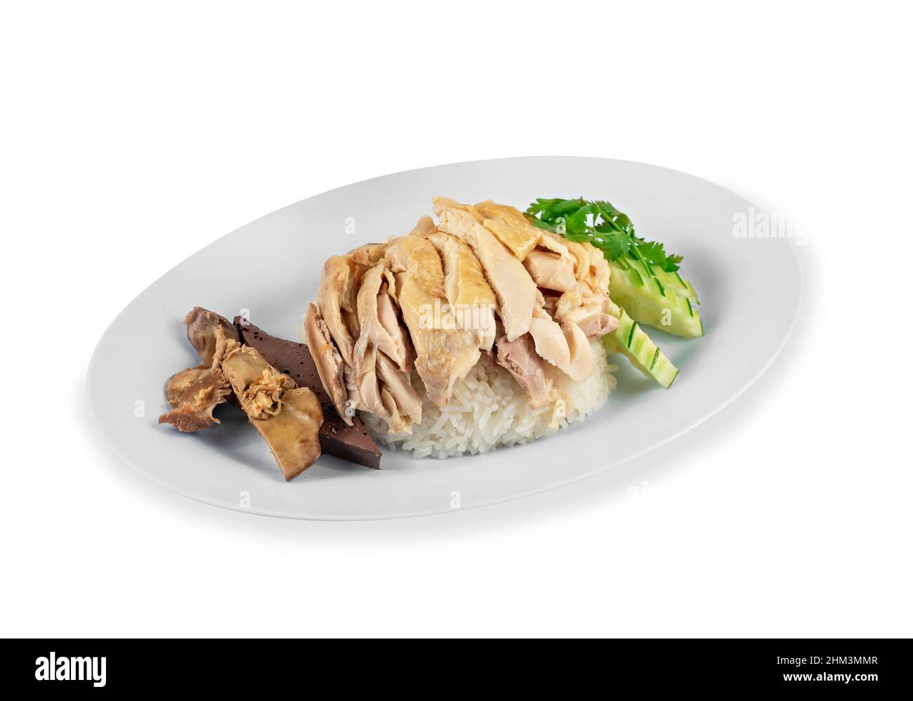 steamed rice served with steamed chicken , liver and fresh vegetables ...