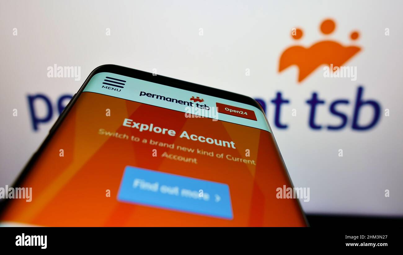 Mobile phone with webpage of Irish company Permanent TSB Group Holdings ...