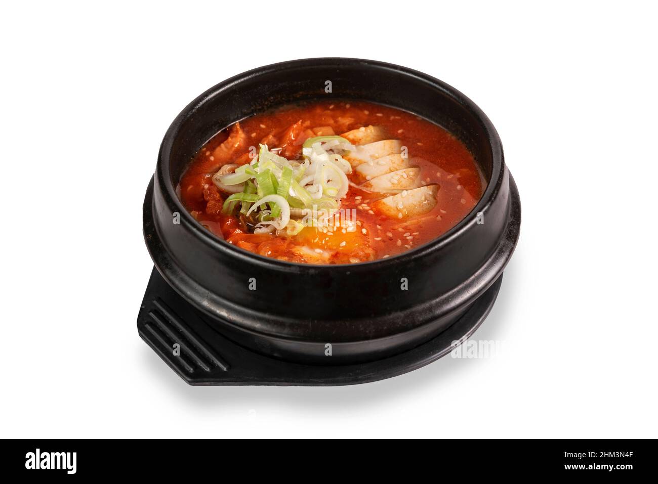 kimchi chigae korean style soup hot and spicy over white background ...