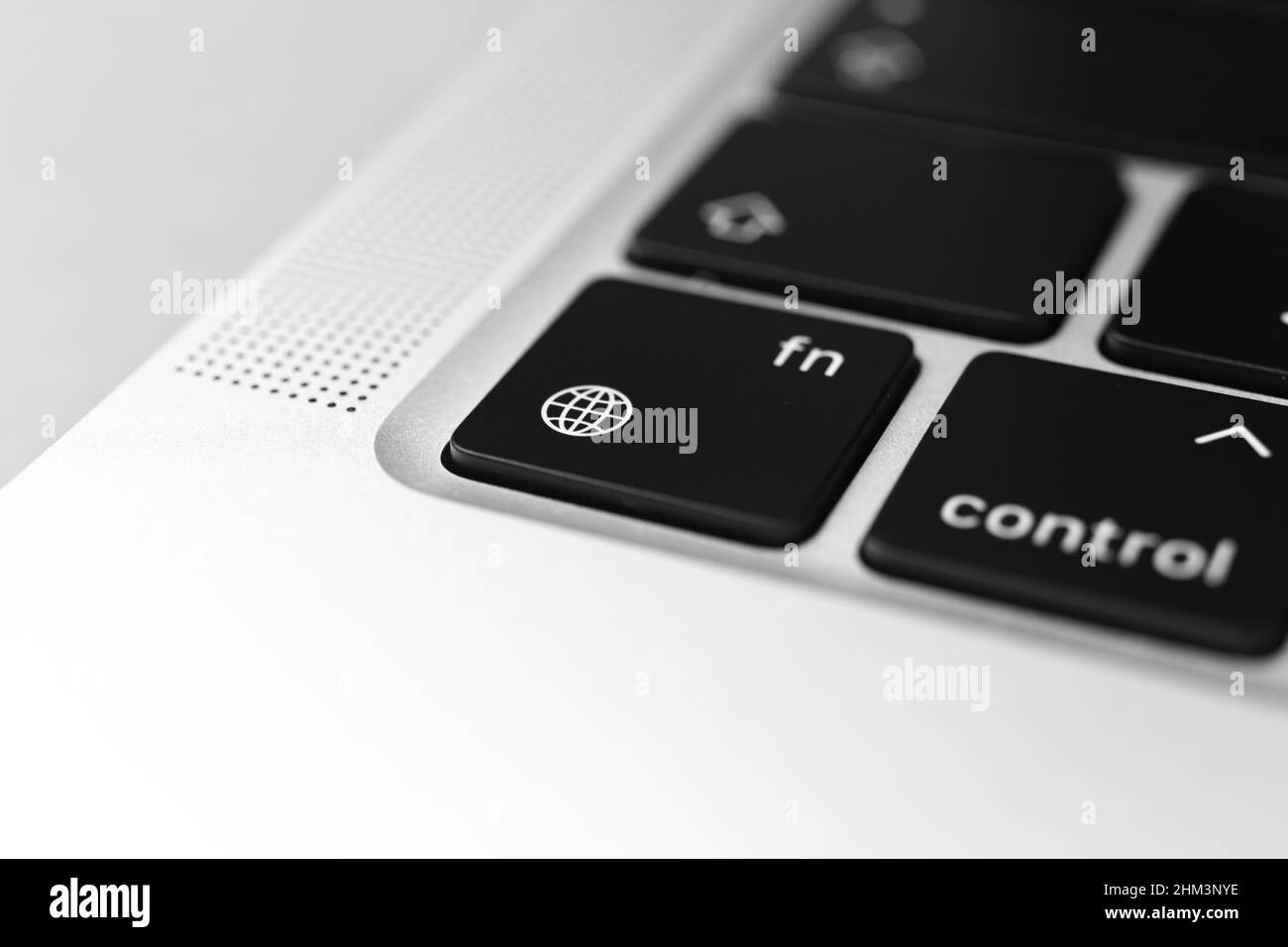 The globe key and button on keyboard. The globe and language settings ...