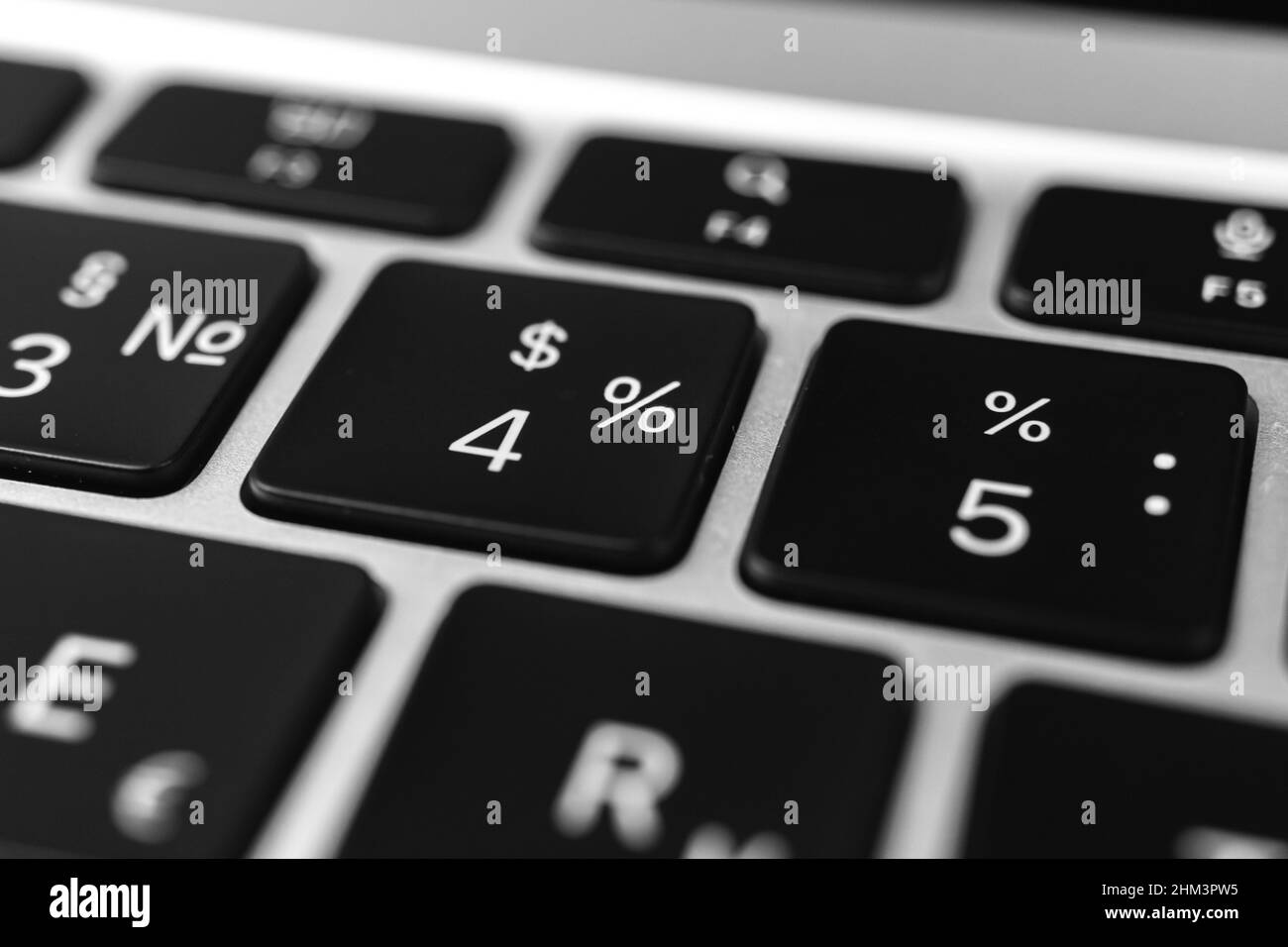 Percent sign key and button on keyboard close-up. Modern laptop ...