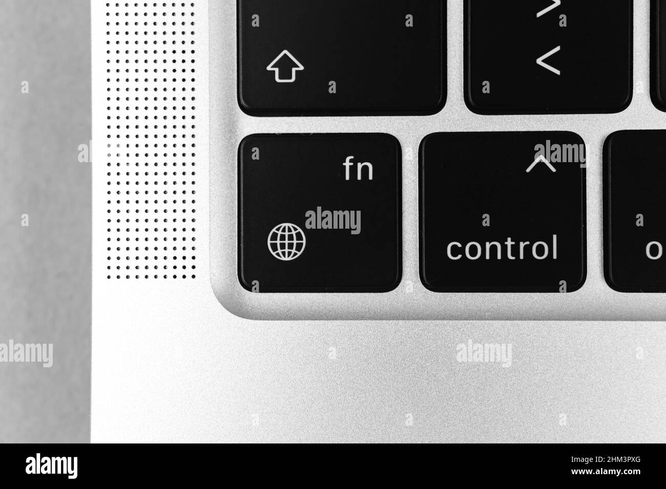 The globe key and button on keyboard. The globe and language settings ...