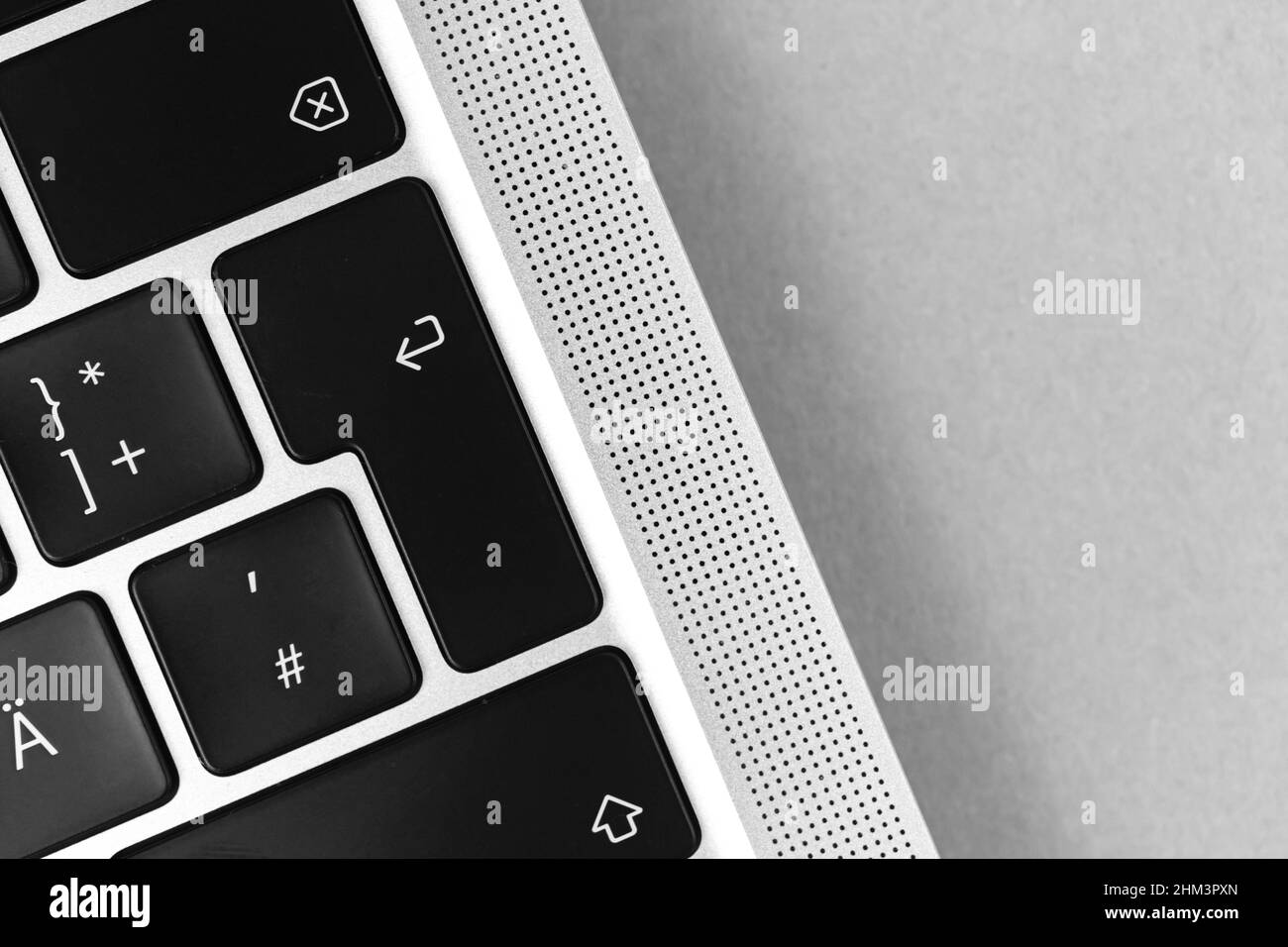 Enter key and button on keyboard. Enter sign close-up. Modern laptop ...