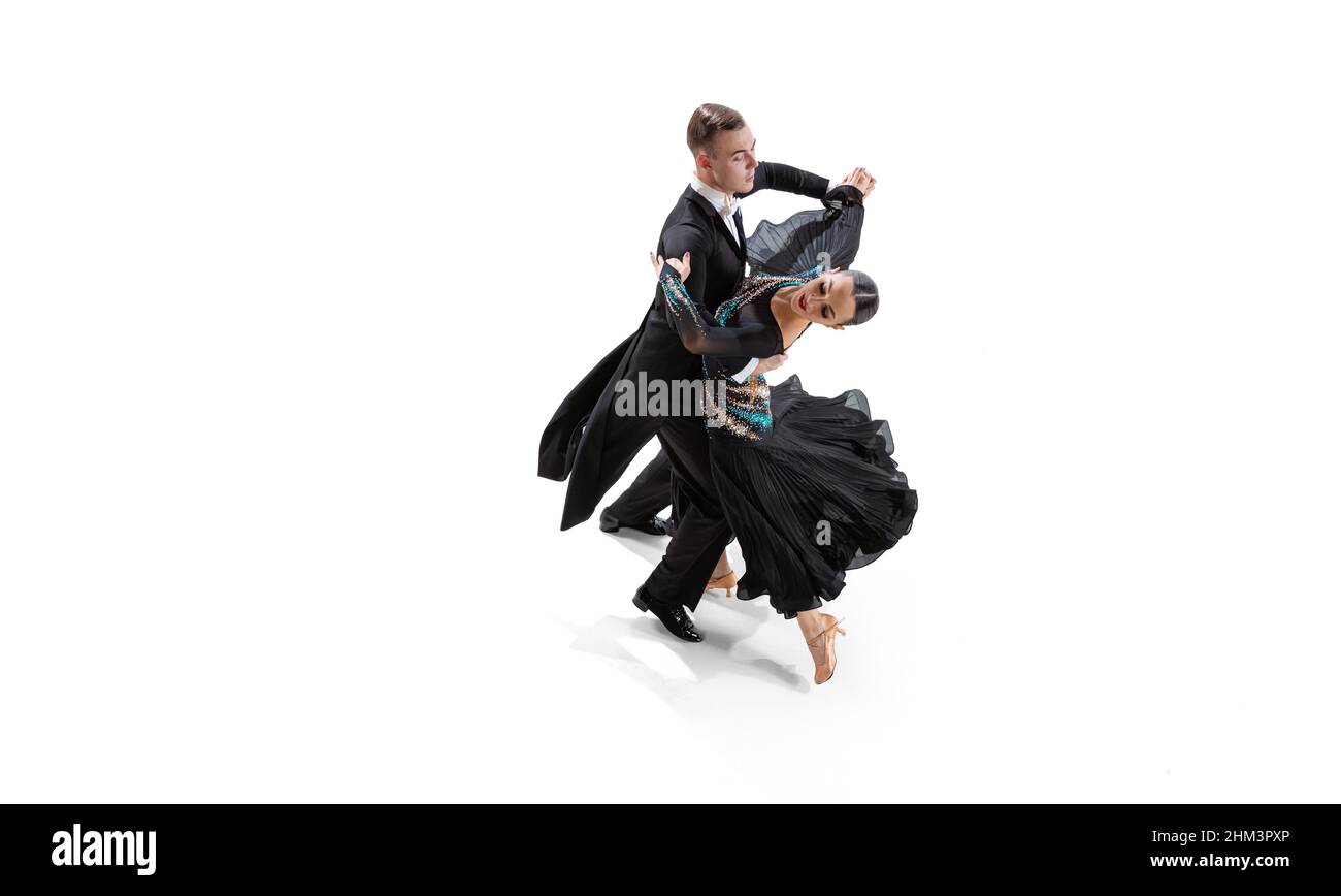 Aerial view of young graceful artistic couple, man and woman dancing ...