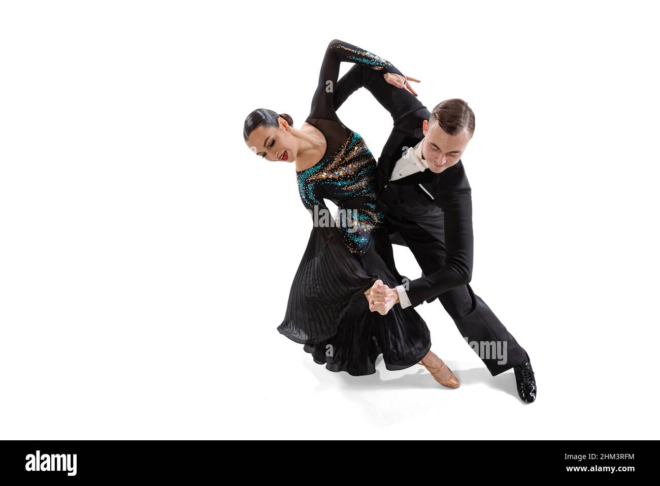 One young graceful artistic couple, man and woman dancing ballroom ...