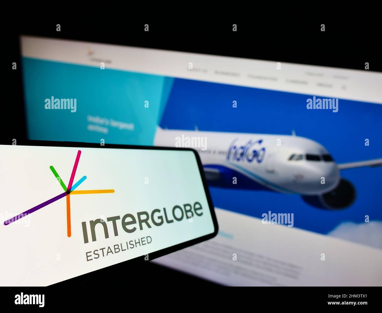 Mobile phone with logo of Indian airline InterGlobe Aviation Ltd ...