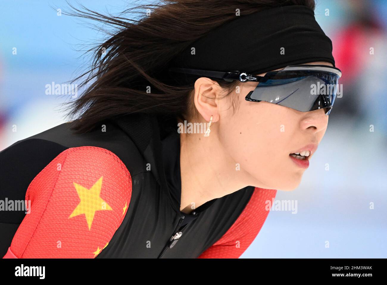 Beijing, China. 7th Feb, 2022. Ahenaer Adake of China reacts after the ...