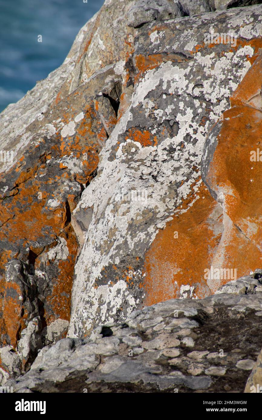 A human face shape identified in the rocks on a cliff Stock Photo - Alamy