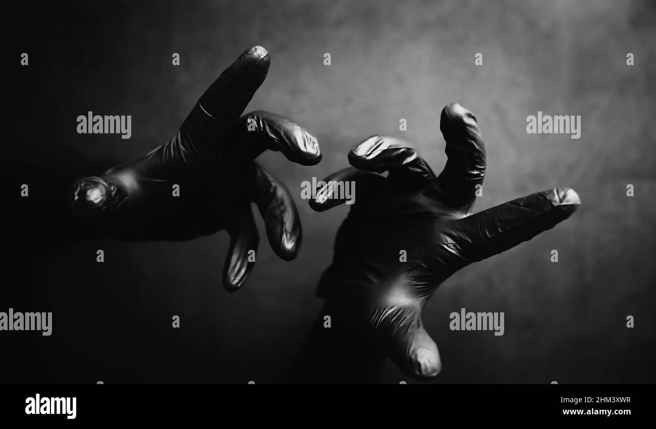 Background of hands in gloves. Black gloves. Hand gestures black gloves ...