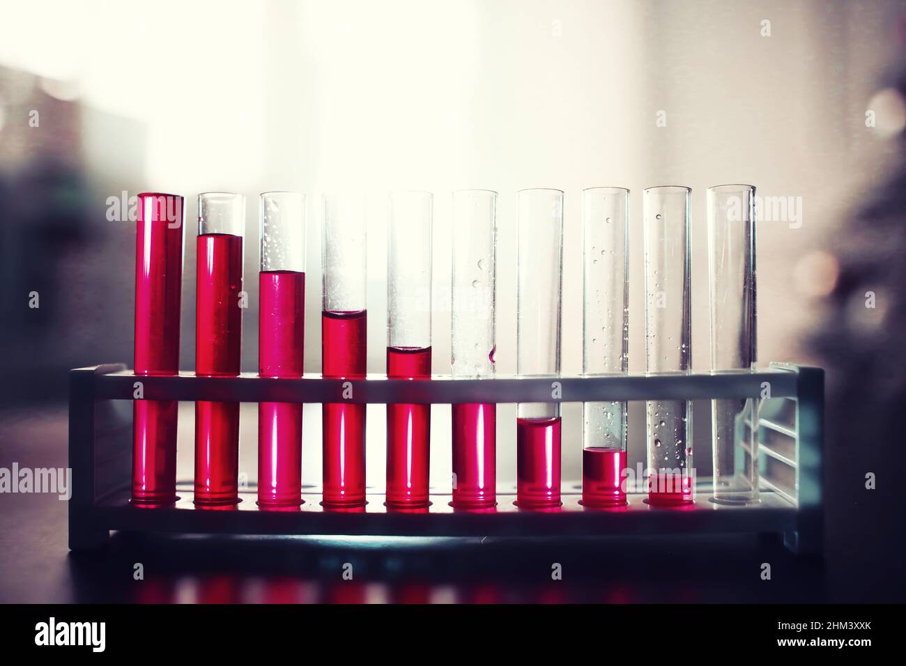 Test tube with blue liquid on laboratory table. Examination of liquid ...