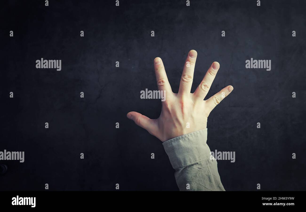 Male hands on a gray background. Finger gestures. Gesticulation hands ...