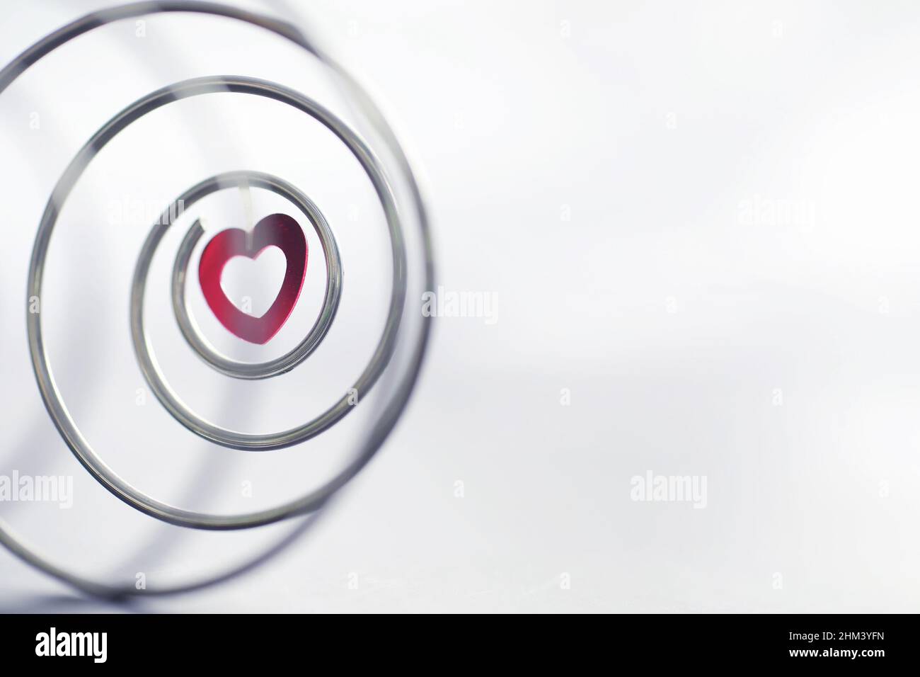 Metal spiral. The concept endless turns. Golden ratio. The concept of ...