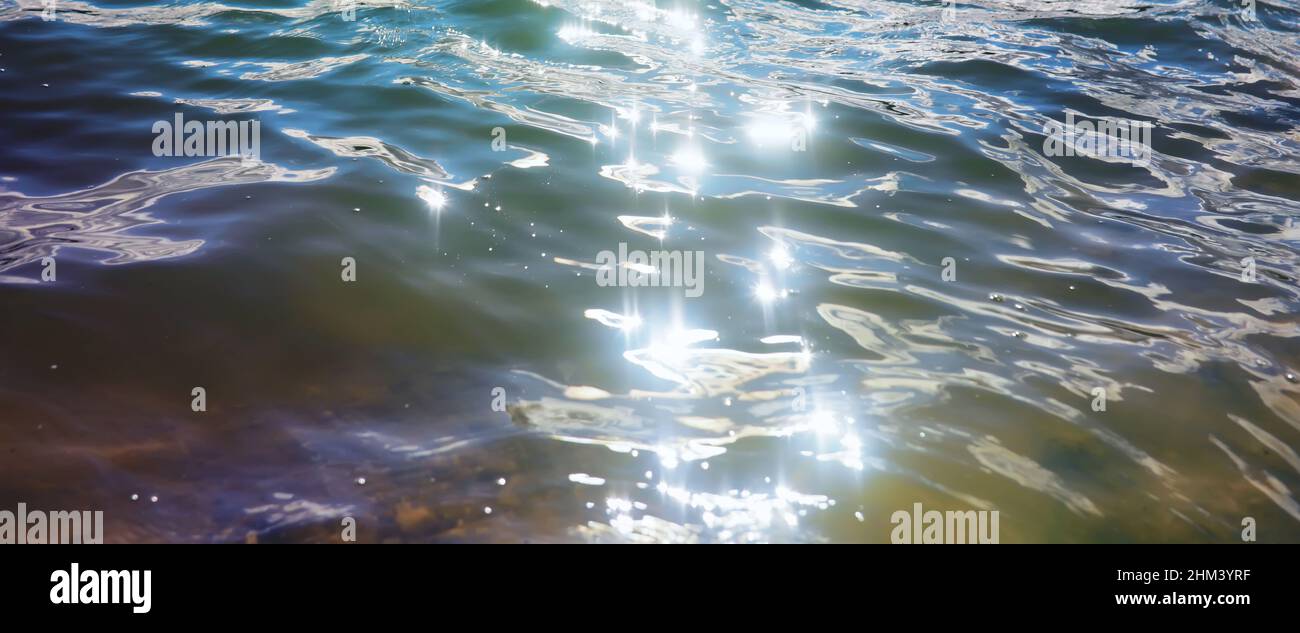 Water surface. The texture of the water. Waves on the lake windy ...
