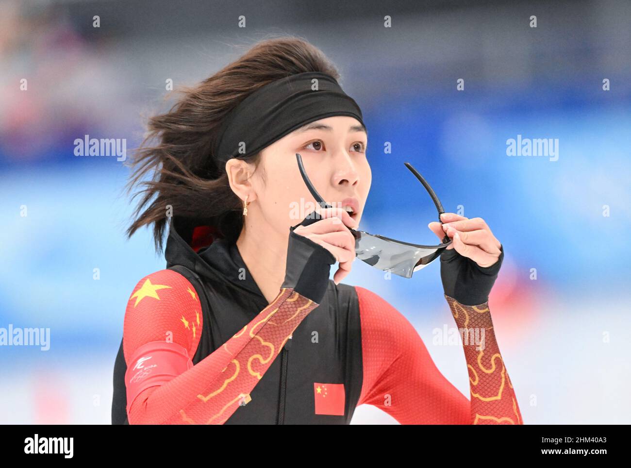 Beijing, China. 7th Feb, 2022. Ahenaer Adake of China reacts after the ...