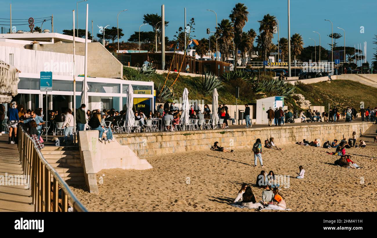Parede, Cascais, Portugal - February 5, 2022: People enjoy a warm ...