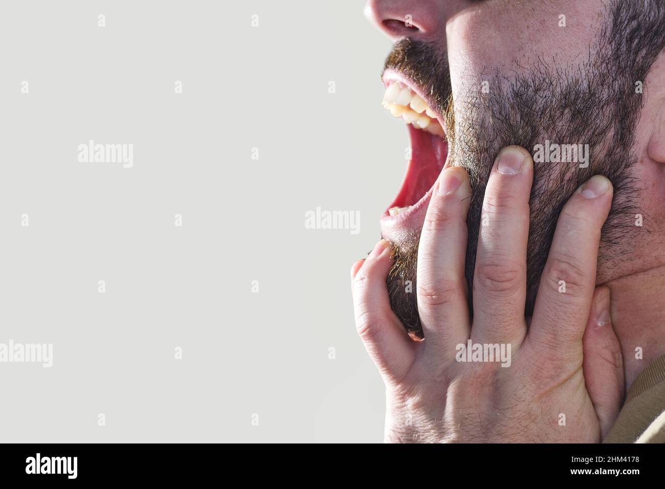 bearded man screaming with mental disorders Stock Photo - Alamy