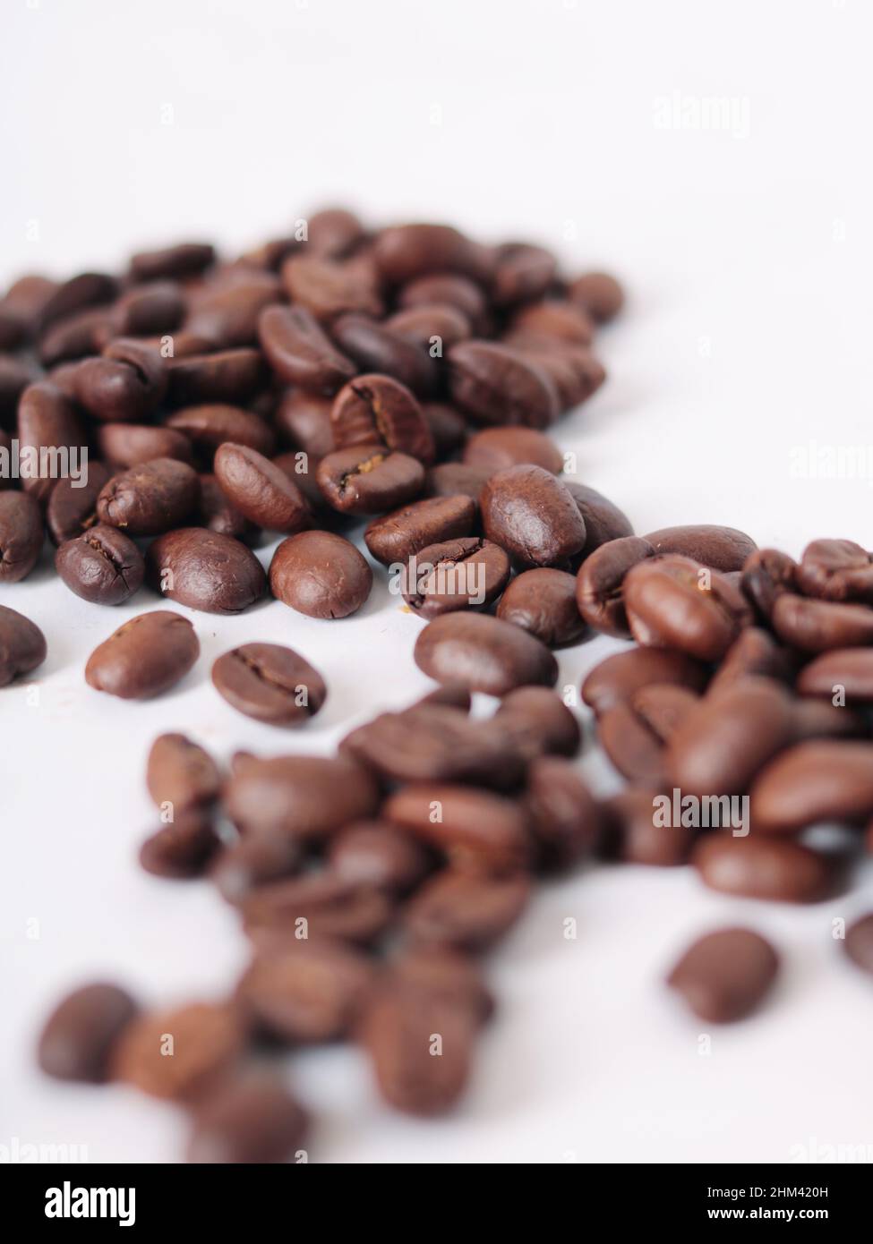 Coffee bean on white background paper Stock Photo - Alamy