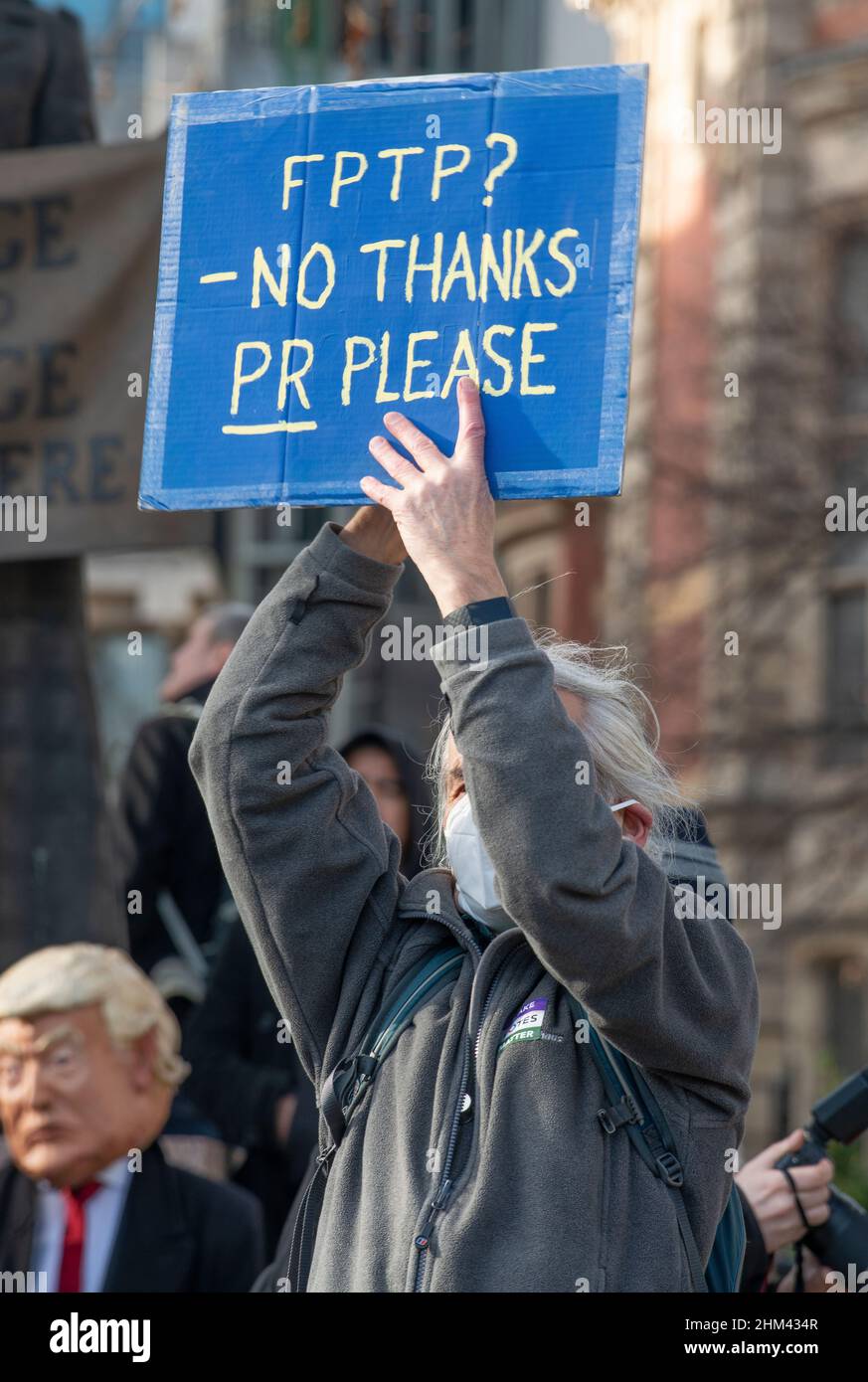 London, UK, 5th February 2022. Protester holding signs at the Make ...