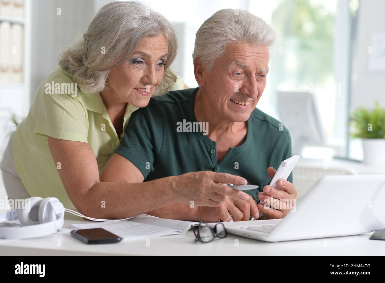 Successful senior businesspeople working together in modern office ...