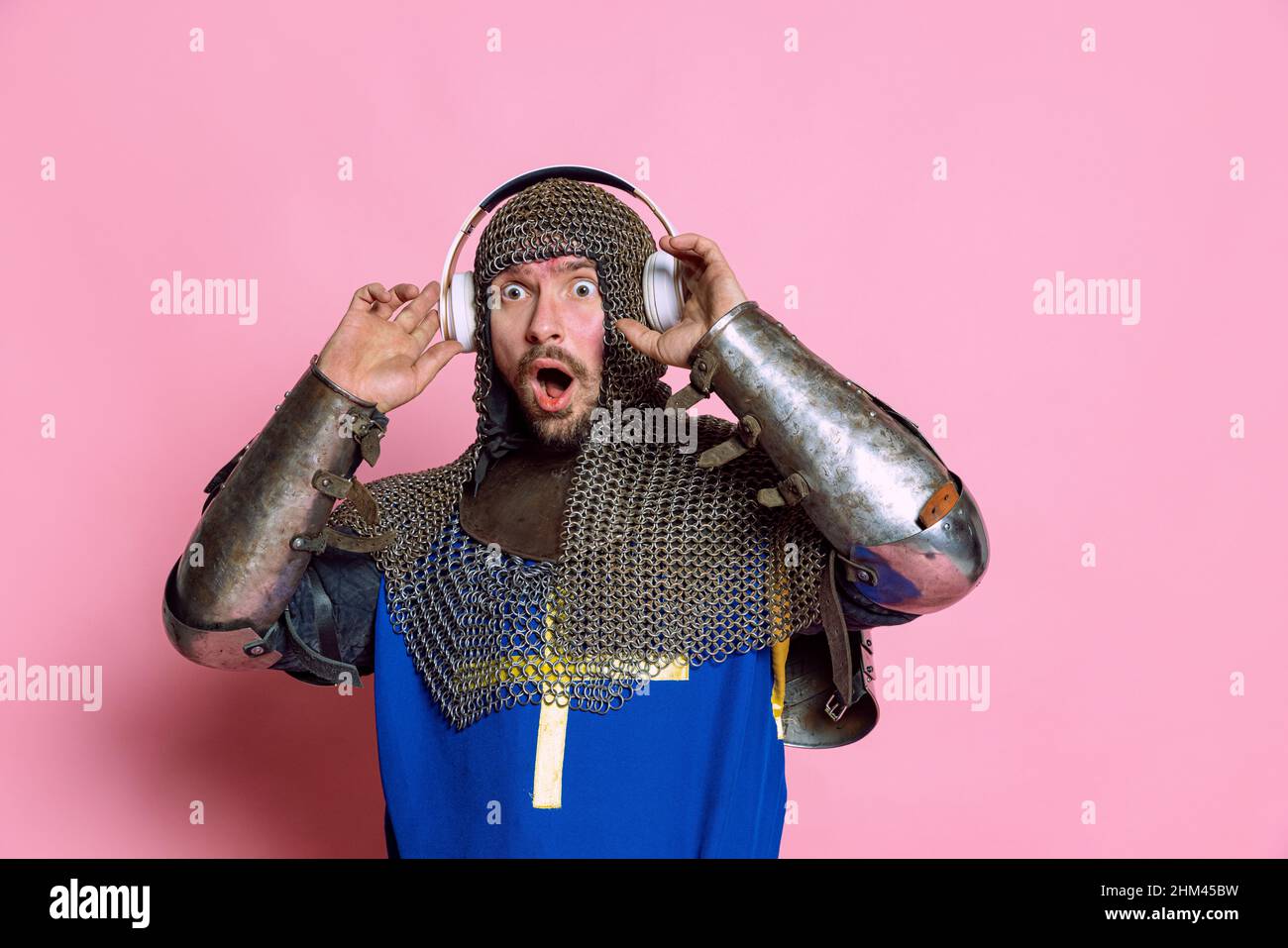 Half-length portrait of man, medieval warrior or knight listening to ...