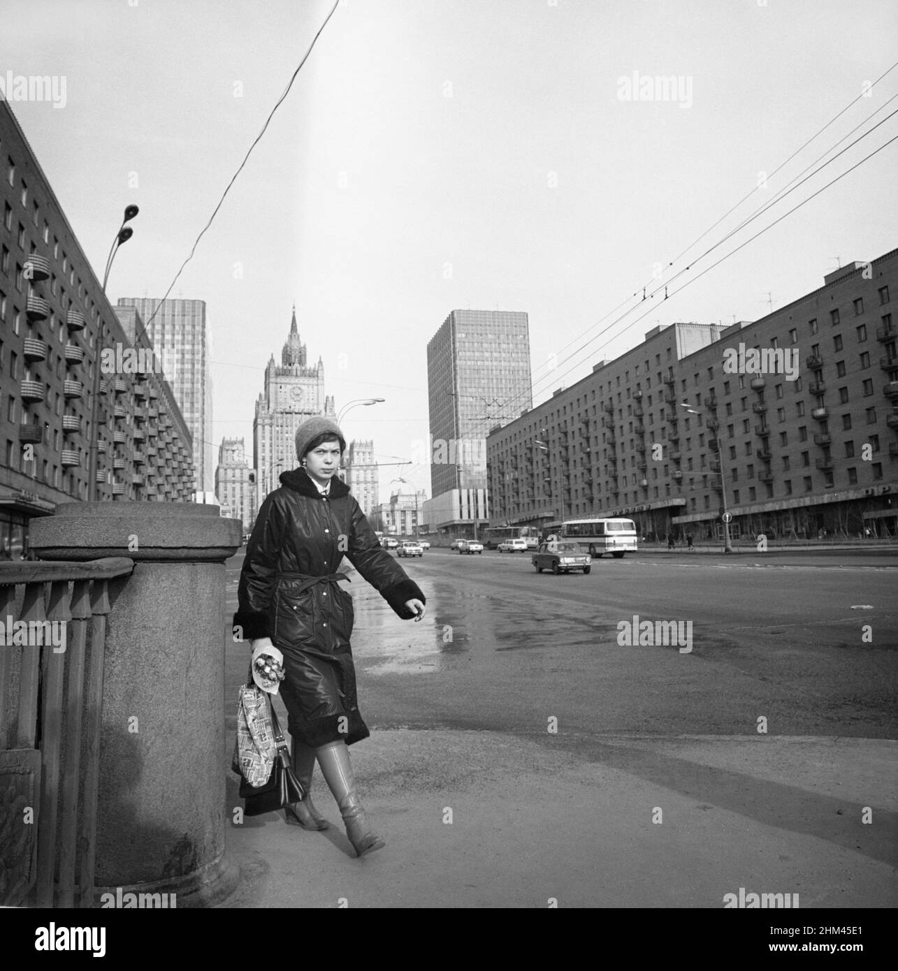 A woman with a bouquet and a bag, Moscow, Russia, USSR, April 1981 ...