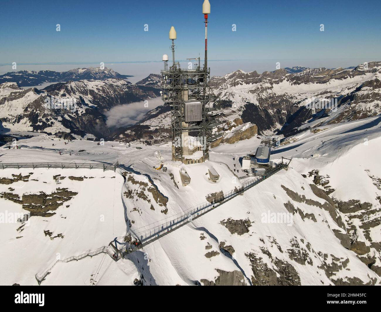 Drone view at the cliffwalk of mount Titlis over Engelberg on the Swiss ...