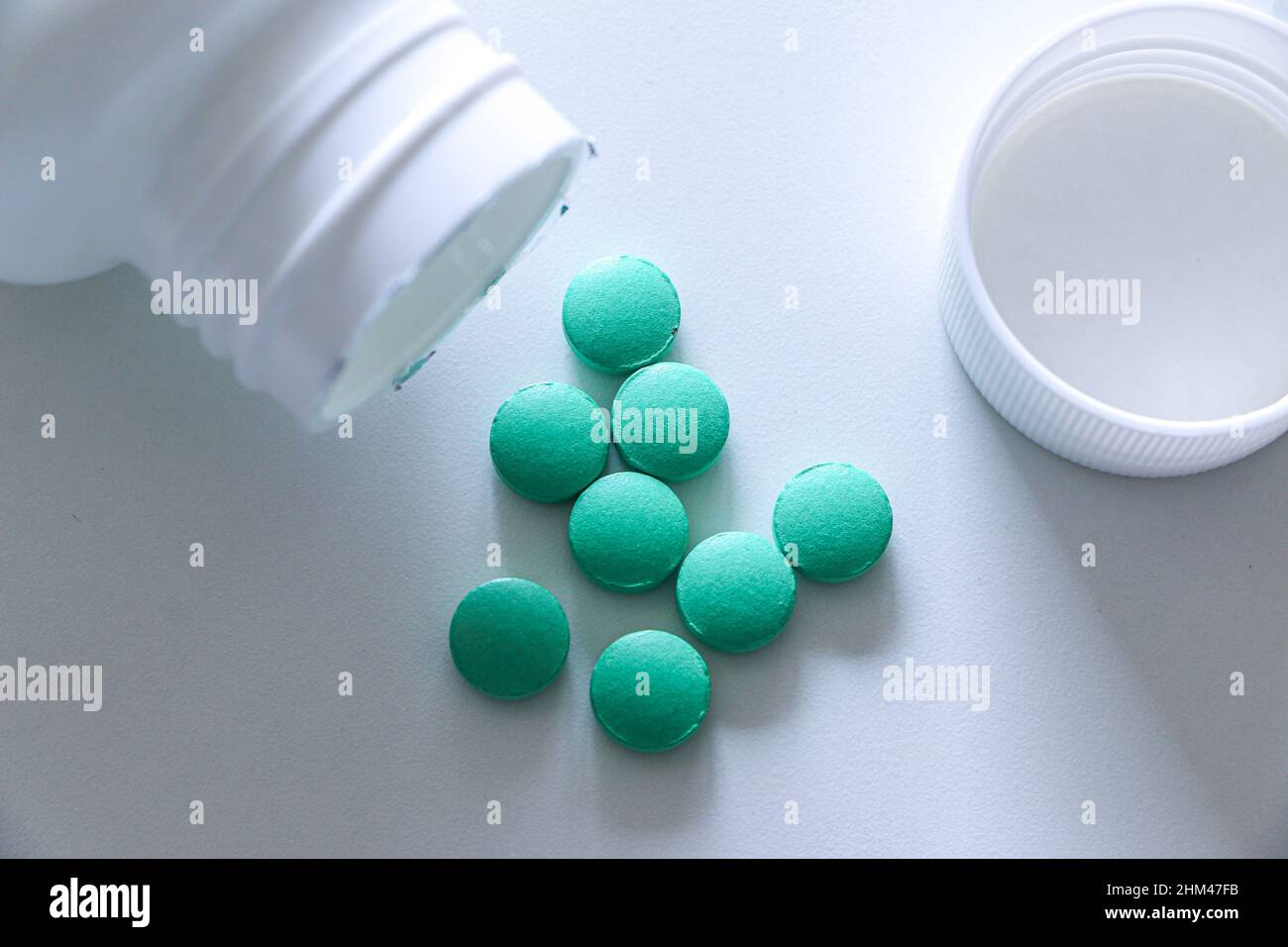 Spilled prescription bottle green hi-res stock photography and images ...