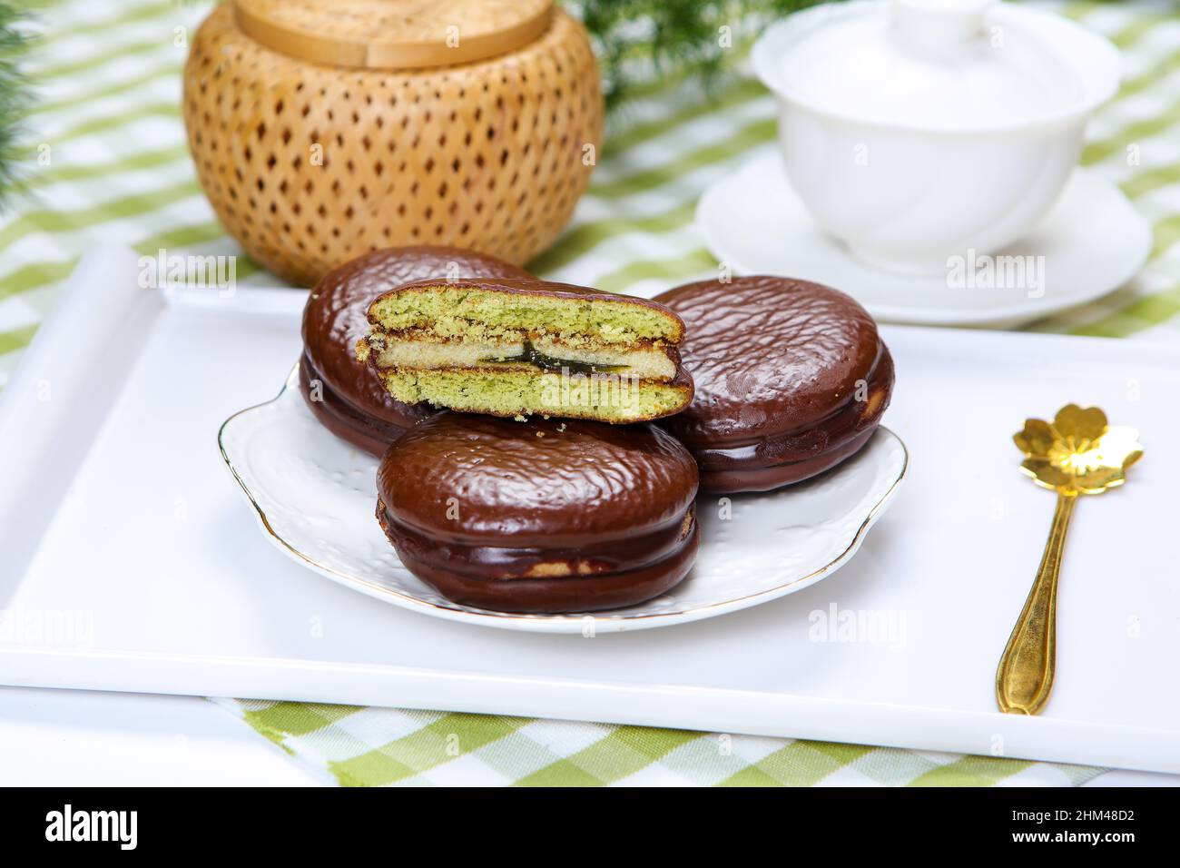 Green tea, chocolate pie Stock Photo - Alamy