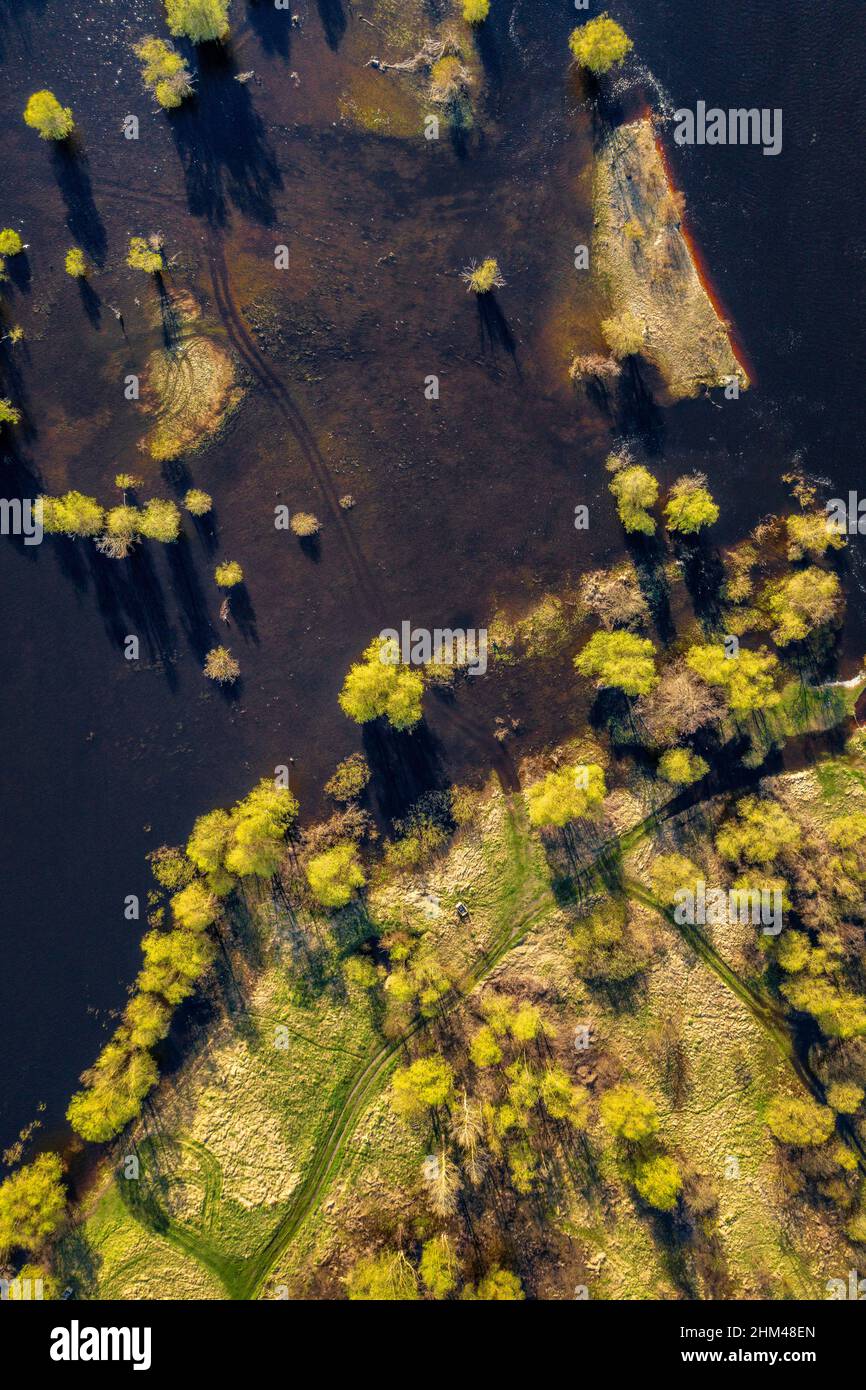 Flooded roads in river bed shot from above. Floodplains of river ...