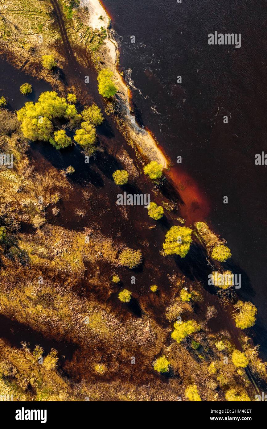 Flooded river bank in spring aerial. Beautiful drowned river delta ...