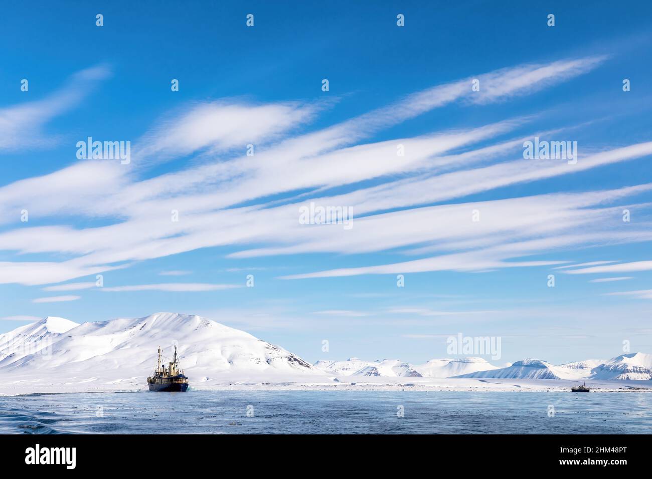 Boat on the fjords of Svalbard, a Norwegian archipelago between ...