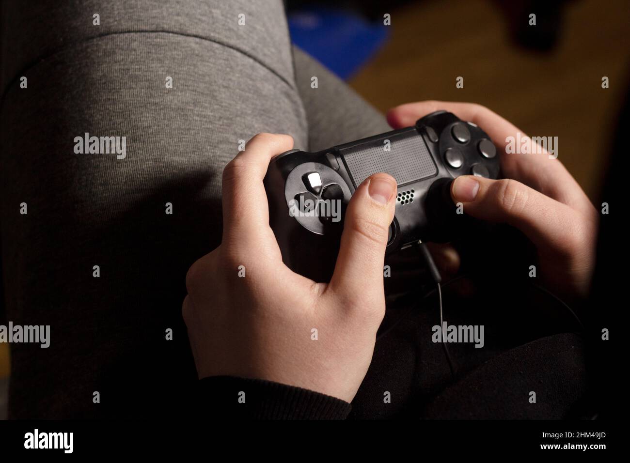 Hand holding video game controller hi-res stock photography and images ...