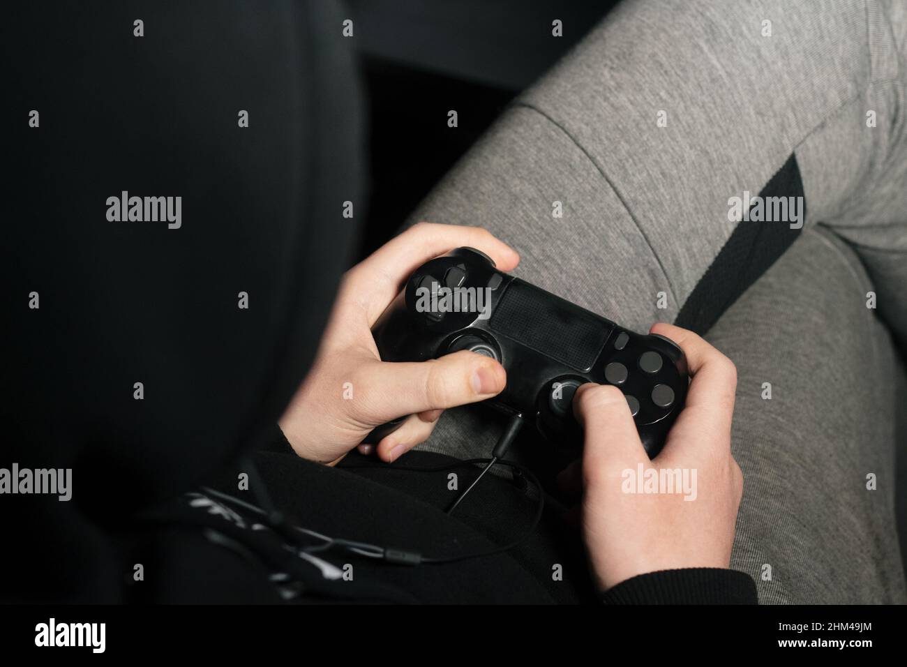 Hand holding video game controller hi-res stock photography and images ...