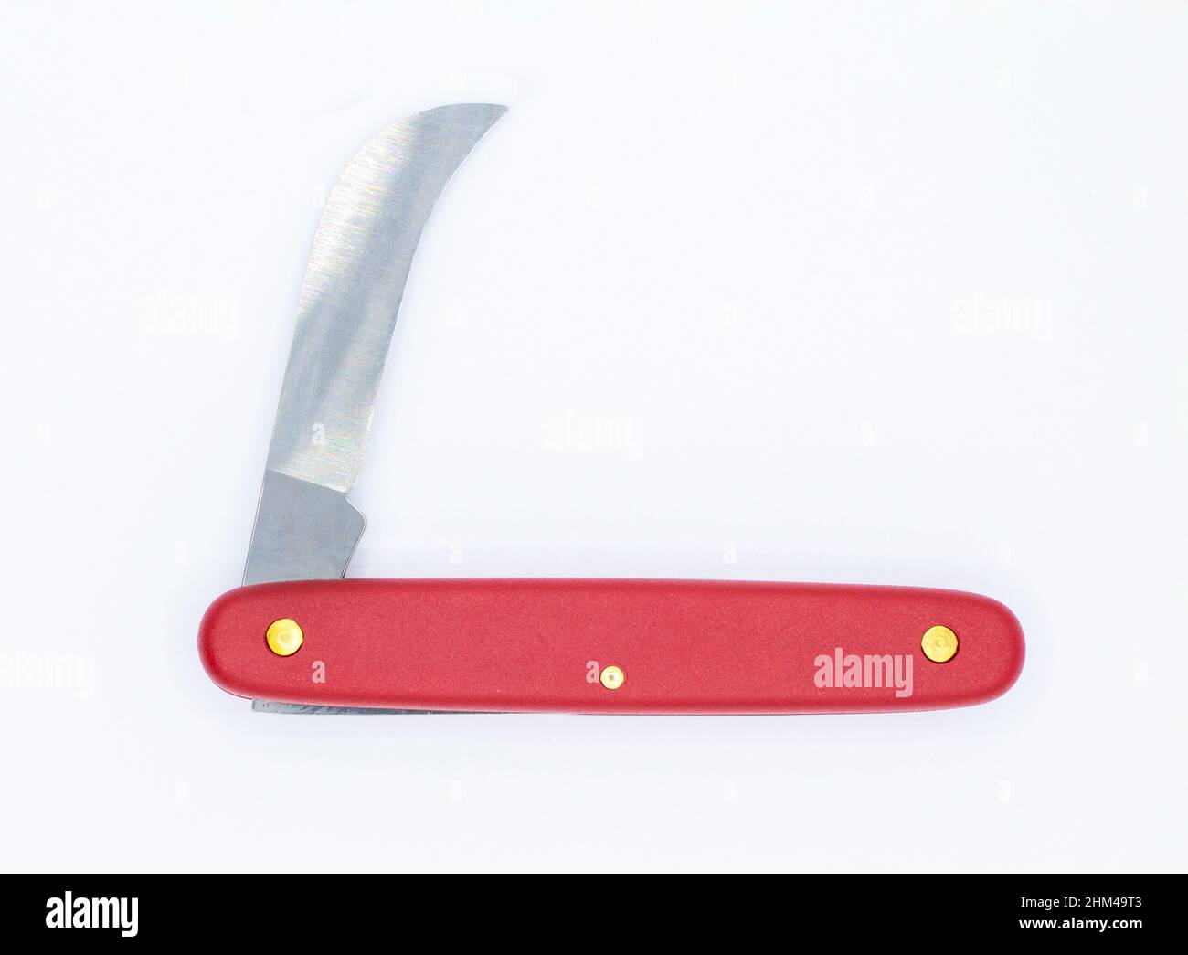 Red handle folding knife isolated on white background Stock Photo - Alamy