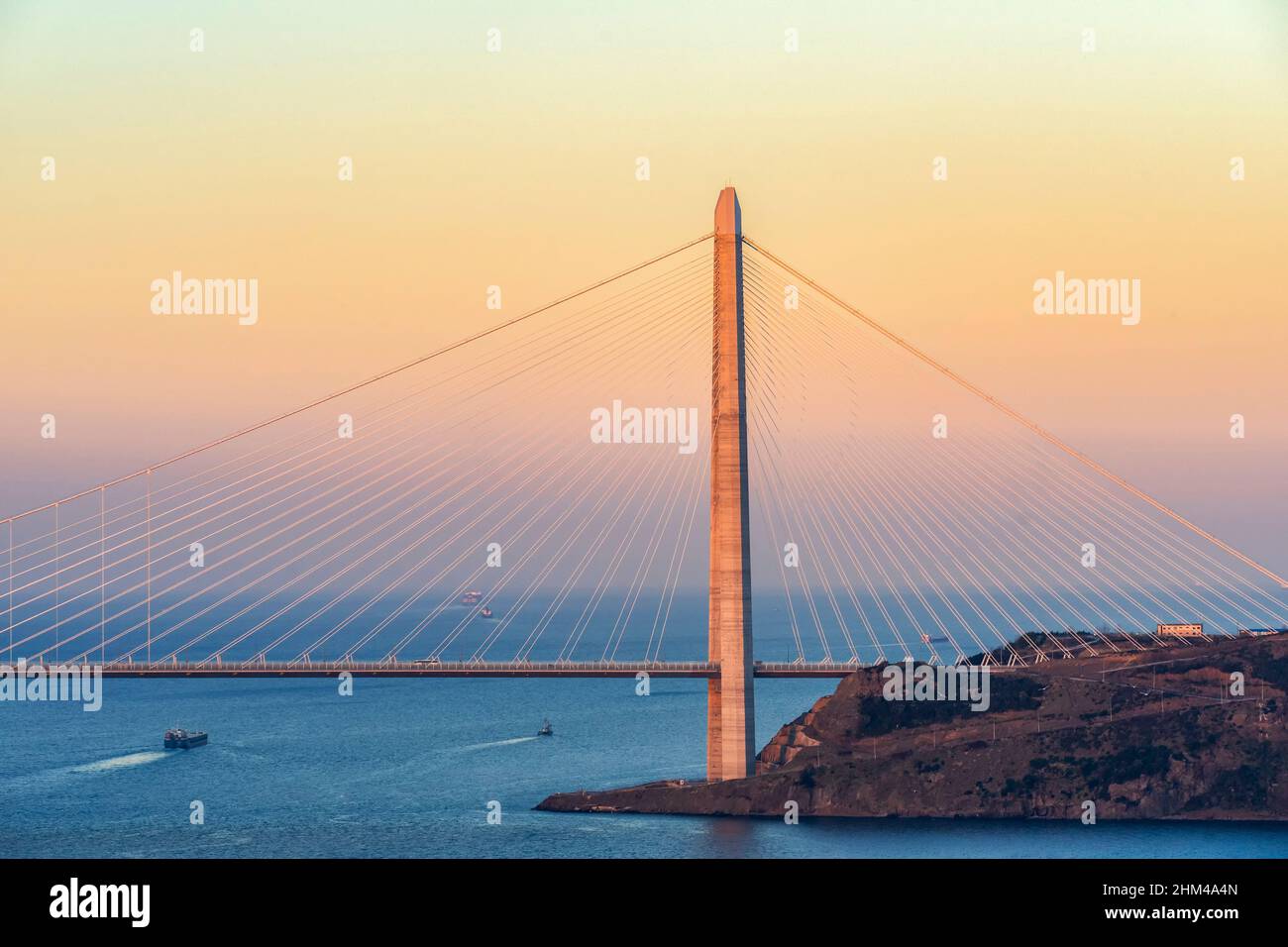 View of Yavuz Sultan Selim Bridge at sunset. It is named the Third ...