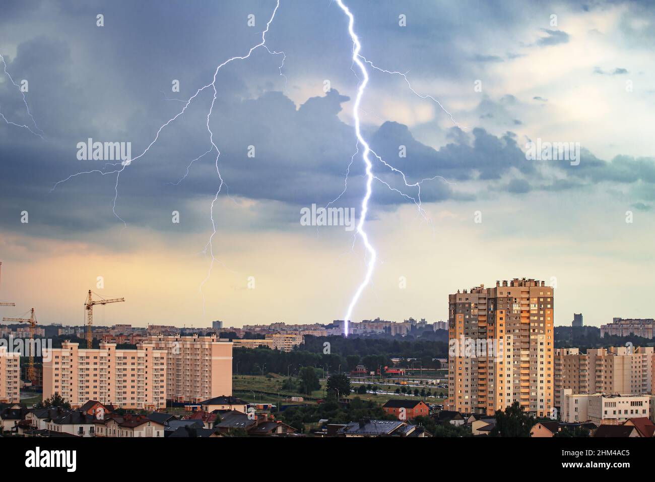 Thunderstorm and lightning over city Stock Photo - Alamy