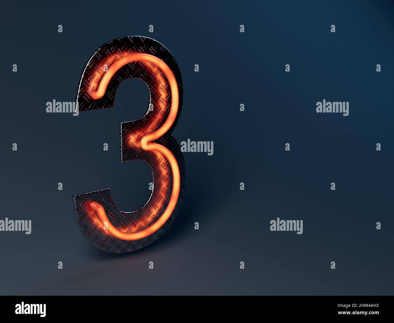 An illuminated orange number three mounted on a shiny metal treadplate ...