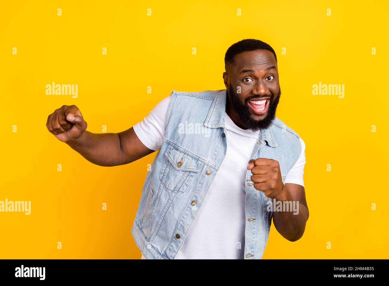 Portrait of attractive lucky cheerful crazy guy dancing having fun ...