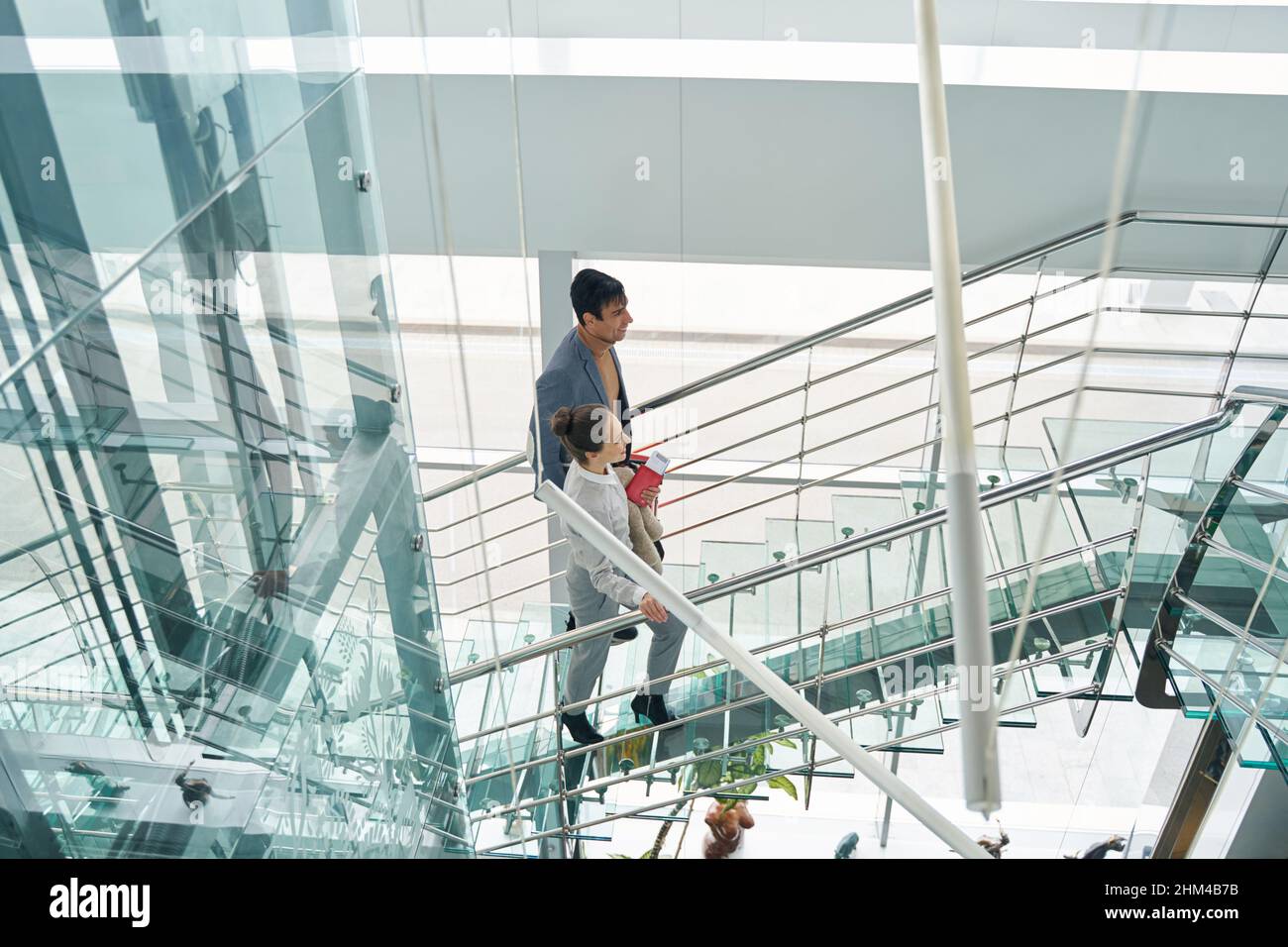 Couple going upstairs hi-res stock photography and images - Alamy